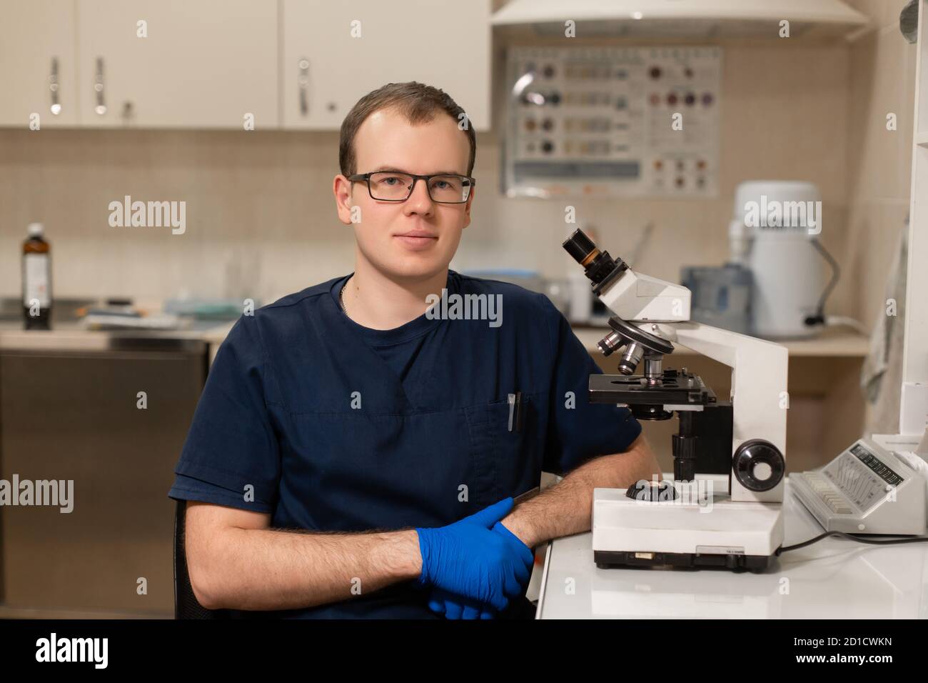 Portrait of young caucasian male scientist, medical worker, tech or ...