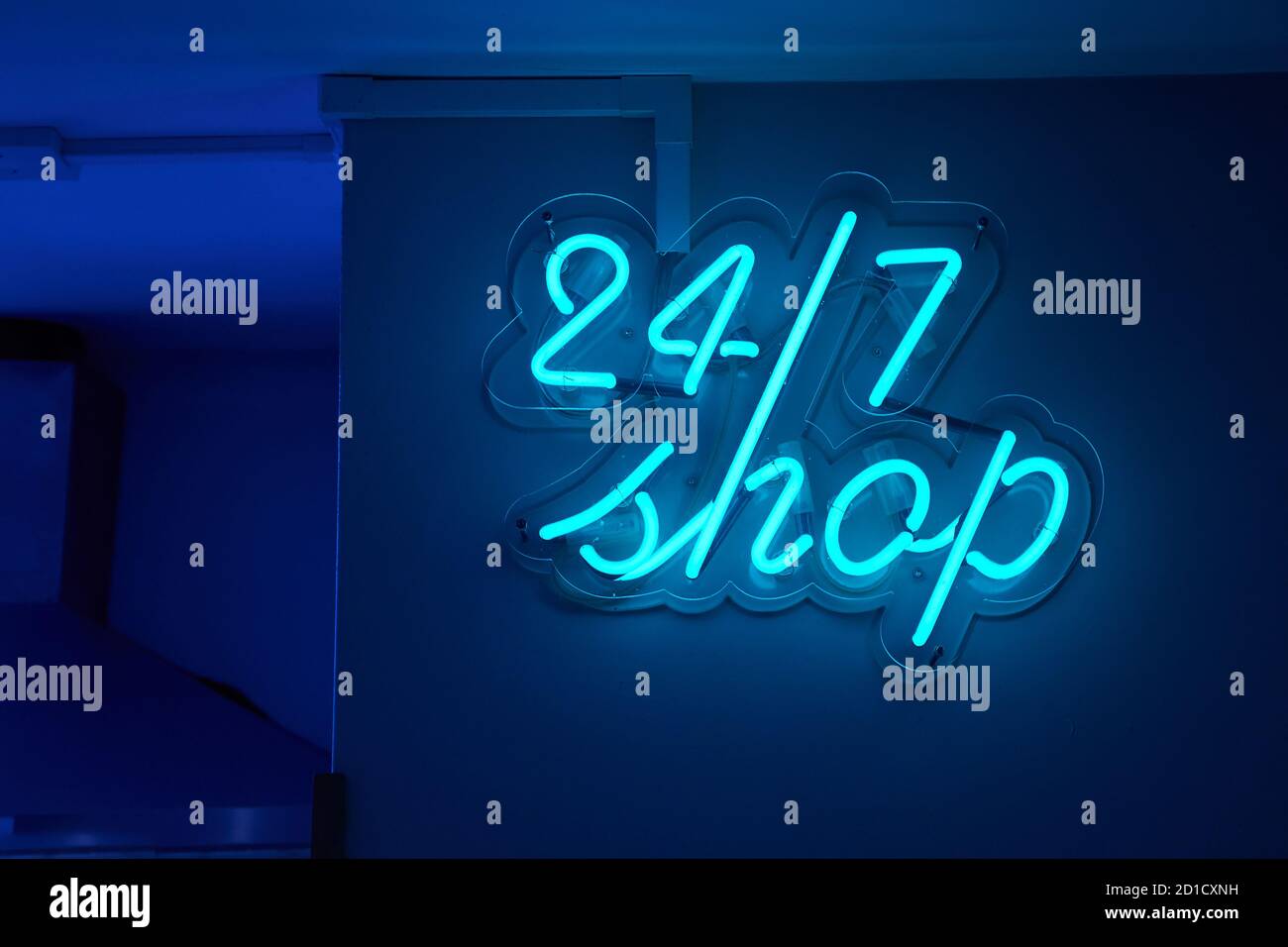 Twenty-four seven shop sign Stock Photo - Alamy