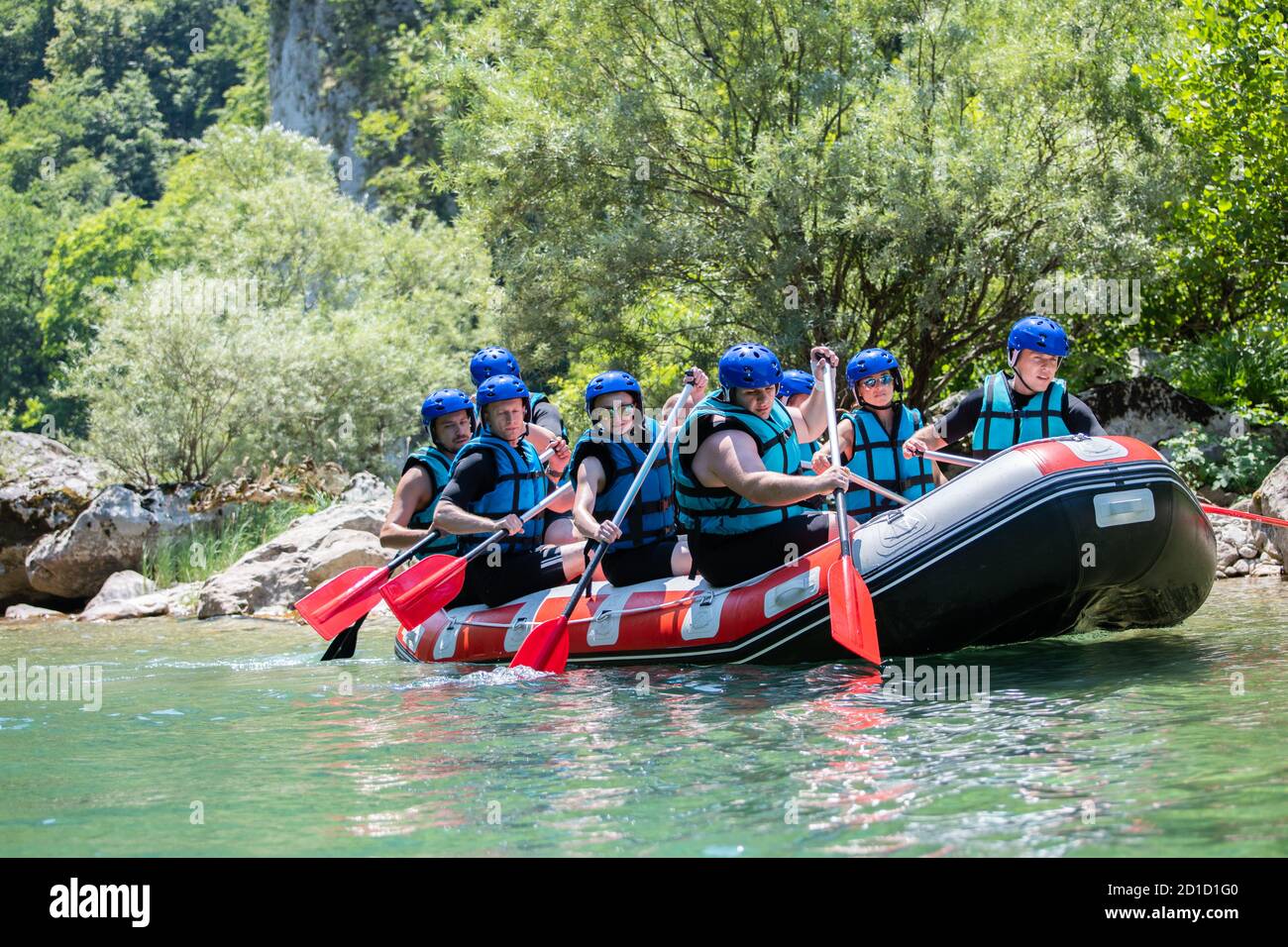 Rafting team goes down the river on the beautiful sunny day Stock Photo ...