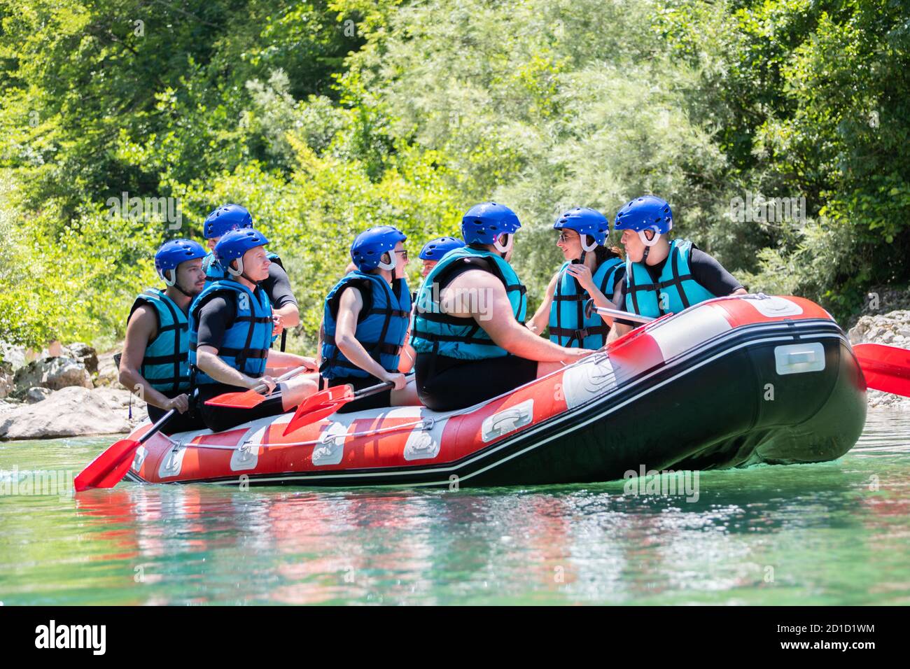 Rafting team goes down the river on the beautiful sunny day Stock Photo ...