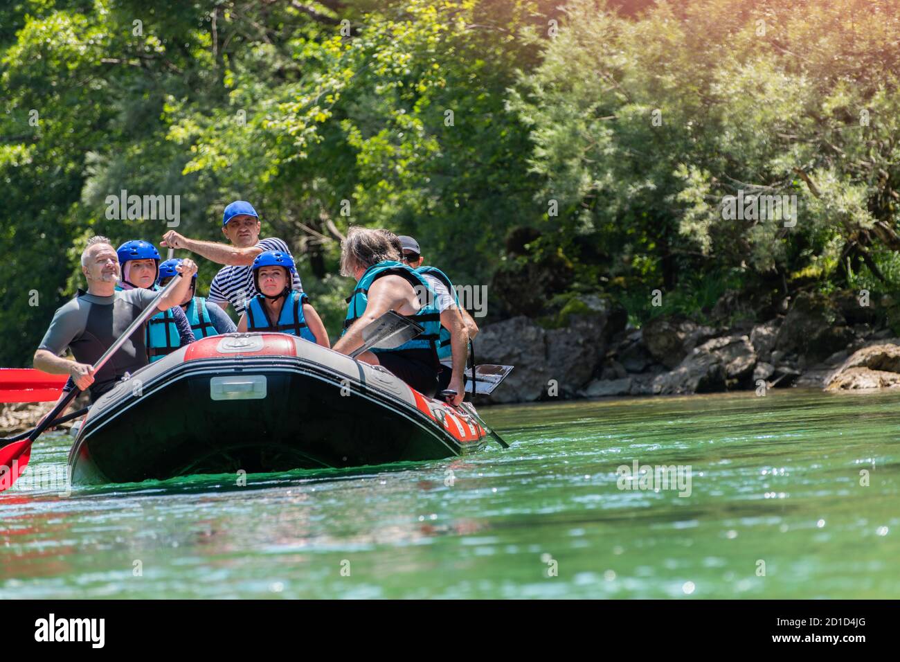 Rafting team goes down the river on the beautiful sunny day Stock Photo ...