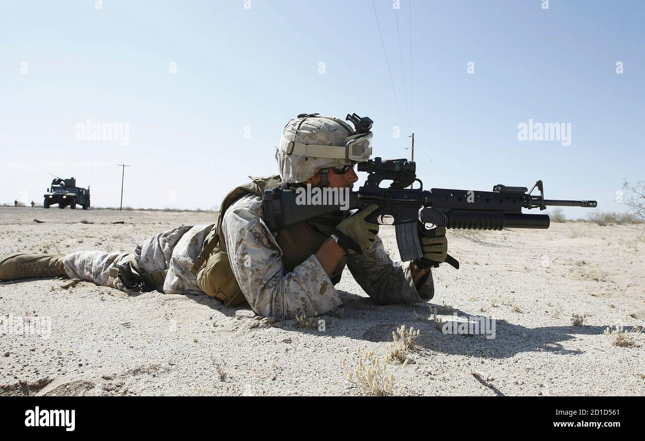 Prone soldier with gun hi-res stock photography and images - Alamy