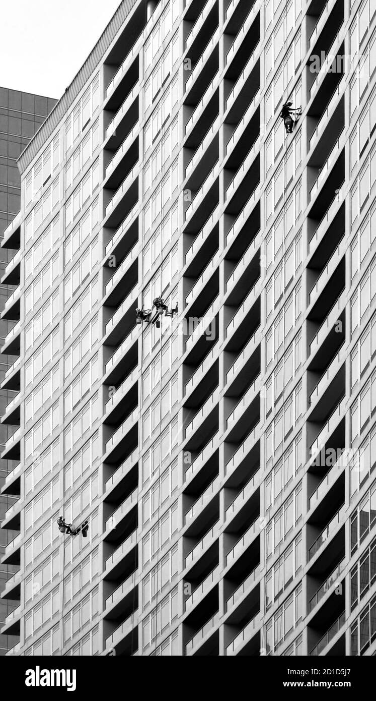 Hanging out window Black and White Stock Photos & Images - Alamy