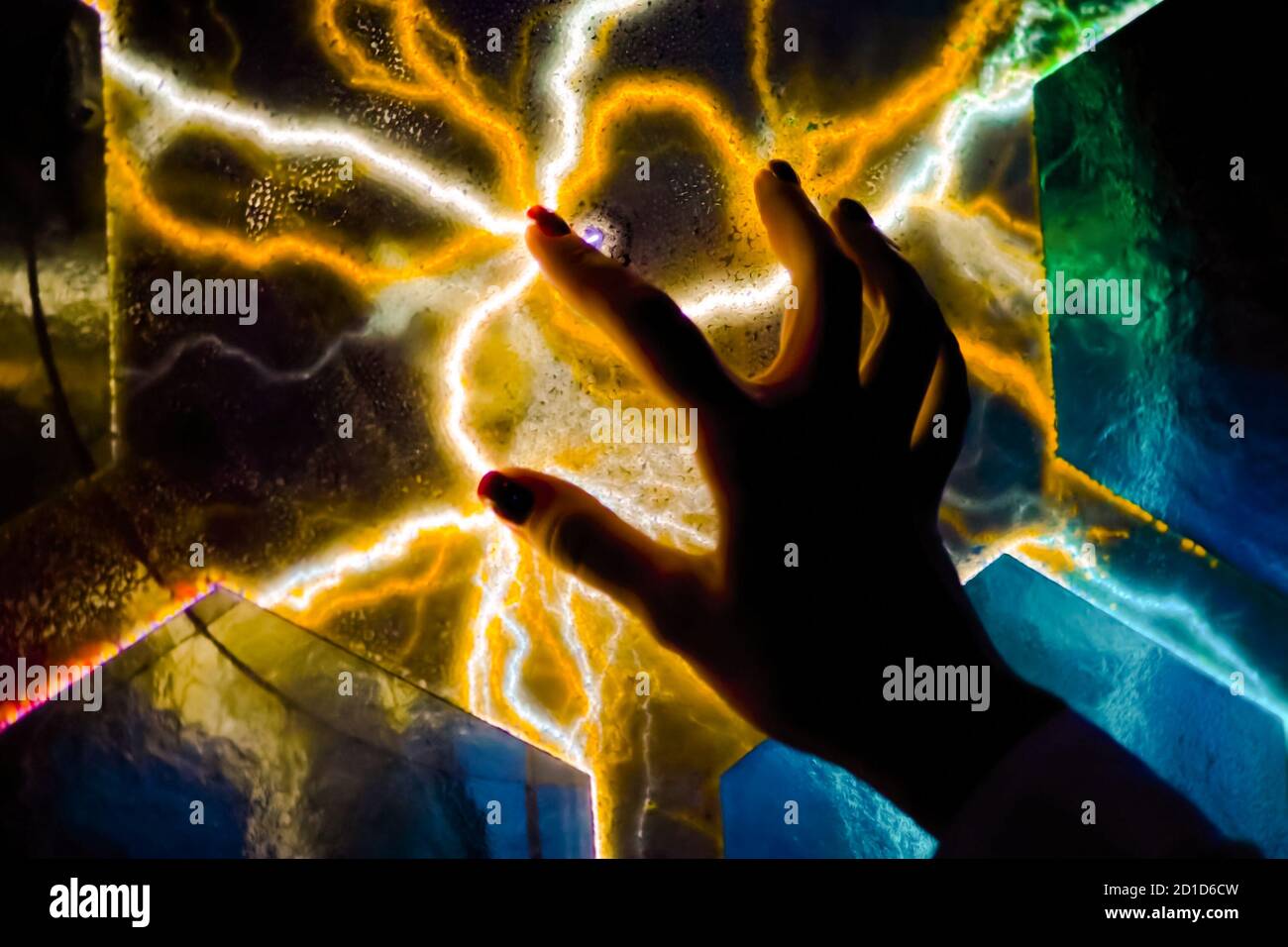 Interactive touchscreen exposition in science museum. Woman hand ...