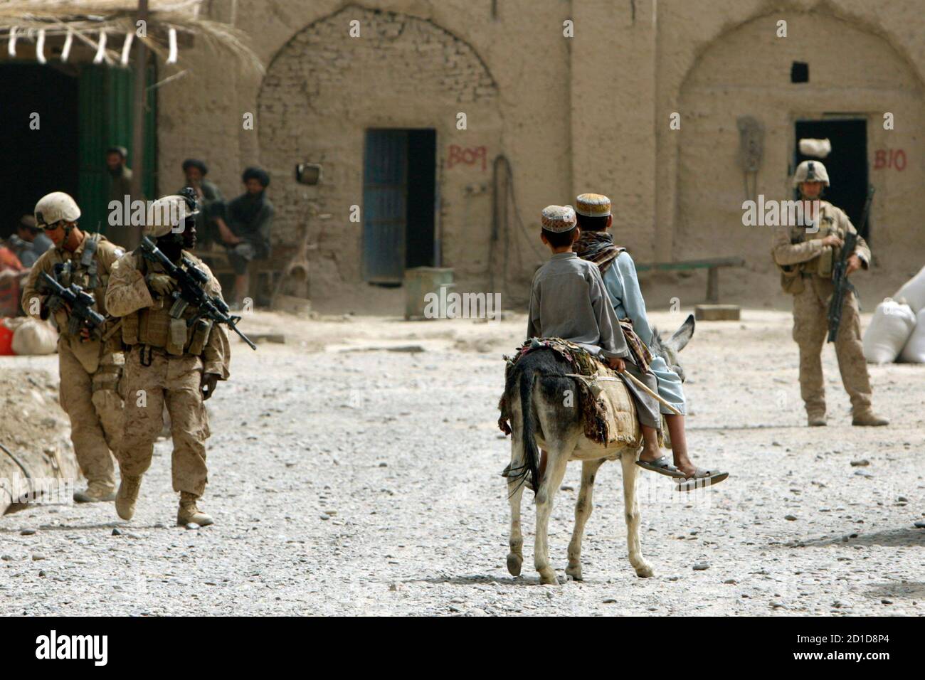 Two boys with a donkey hi-res stock photography and images - Alamy