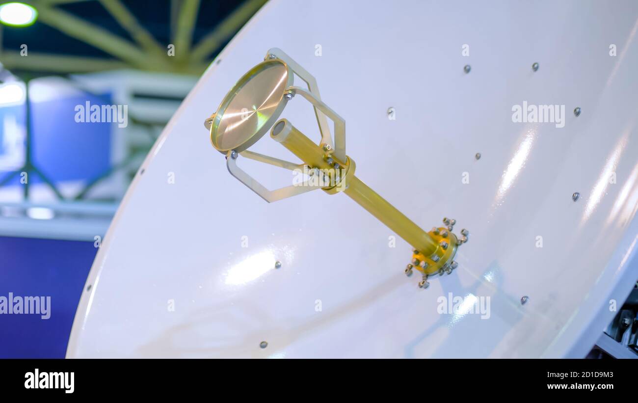 White rotating satellite dish antenna, VSAT parabolic receiver using to receive or transmit ...