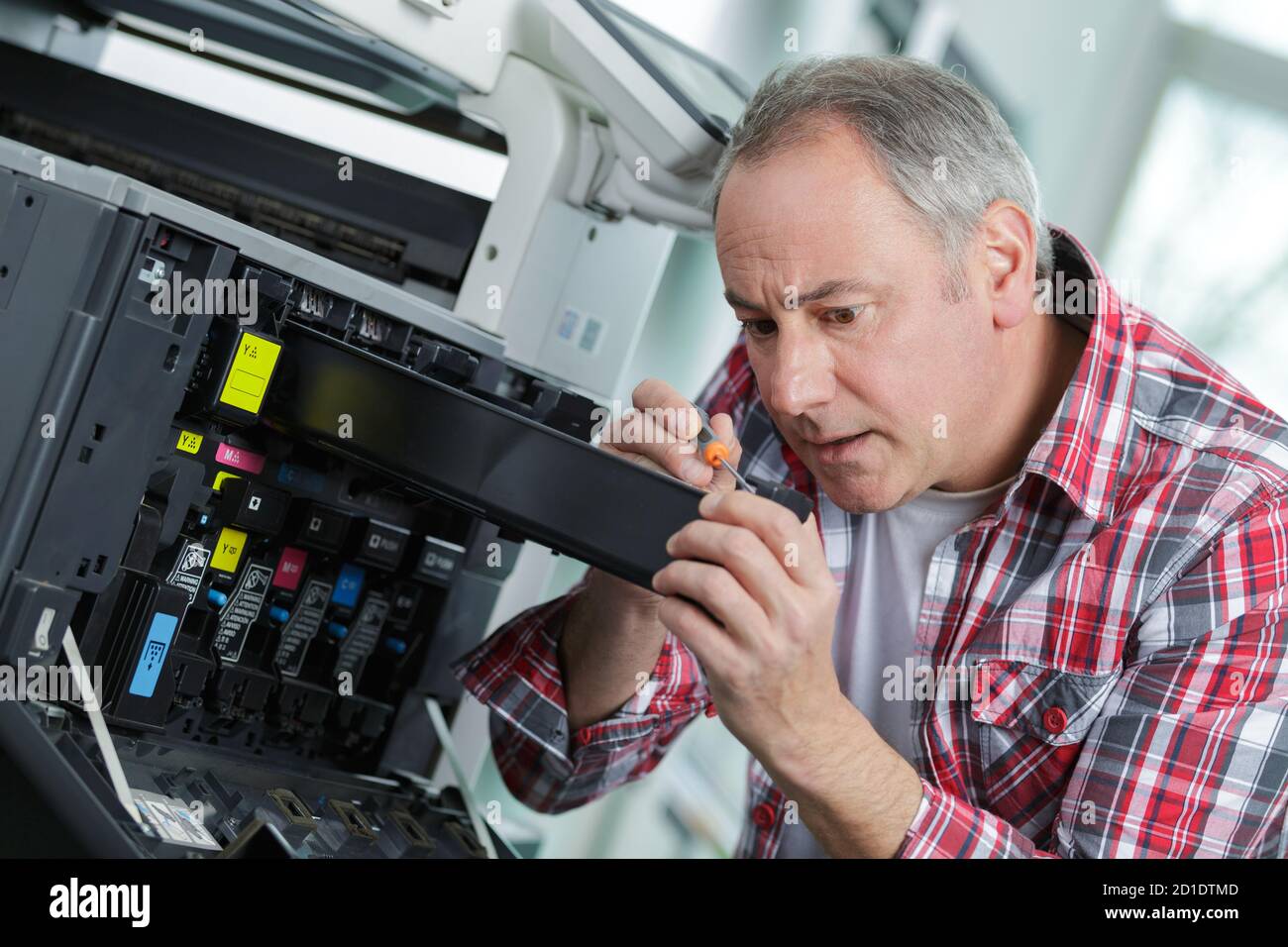man opening photocopier in office Stock Photo - Alamy