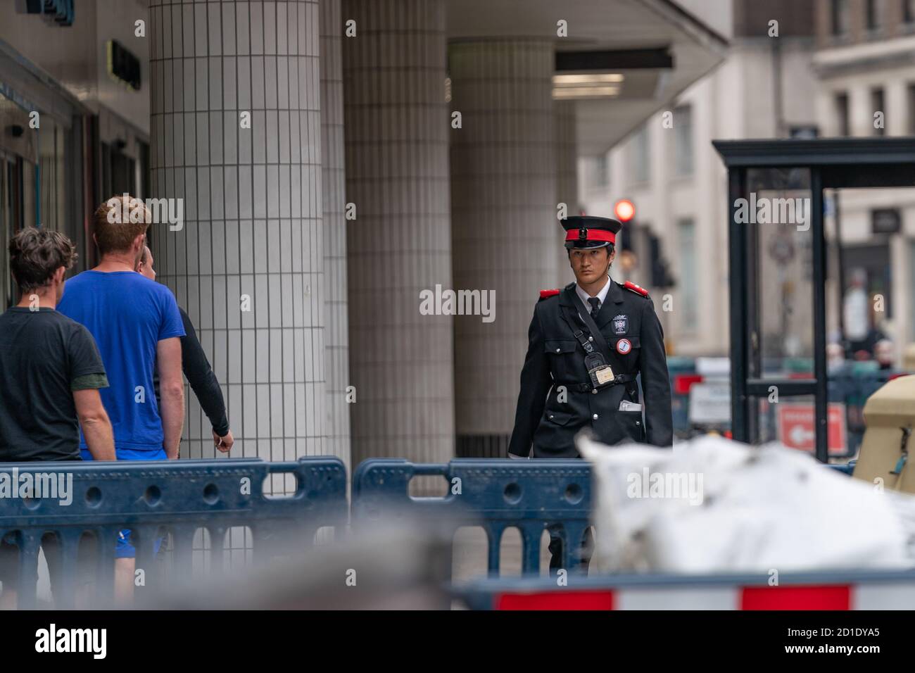 Warden uniform walk parking car hi-res stock photography and images - Alamy