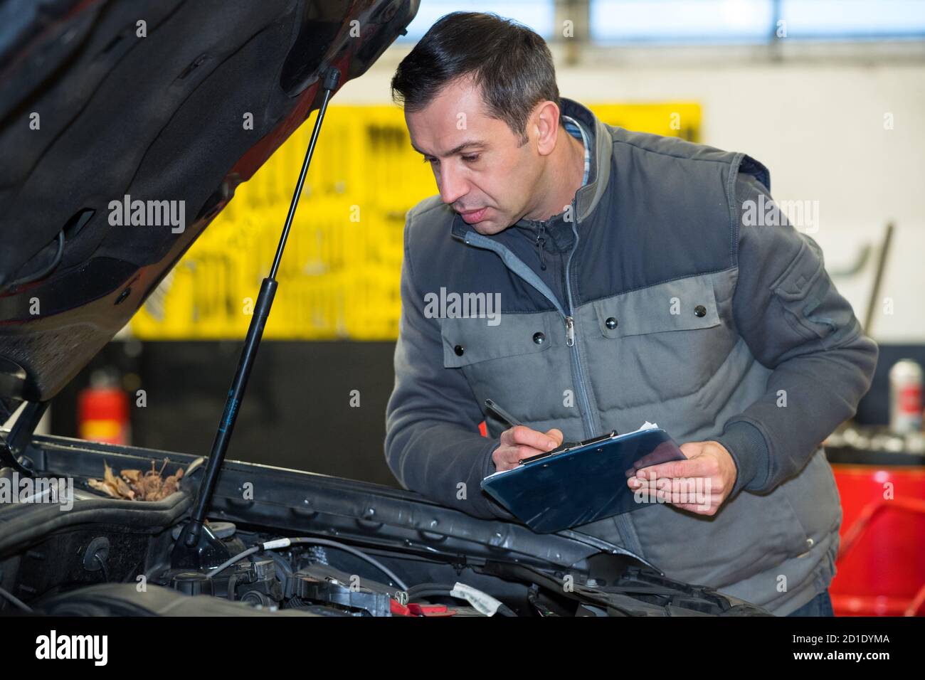 man with checking car engine Stock Photo - Alamy