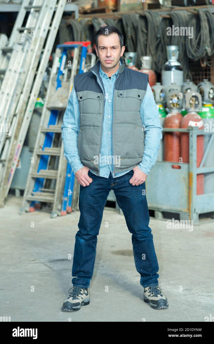 Man in jeans work gloves hi-res stock photography and images - Alamy