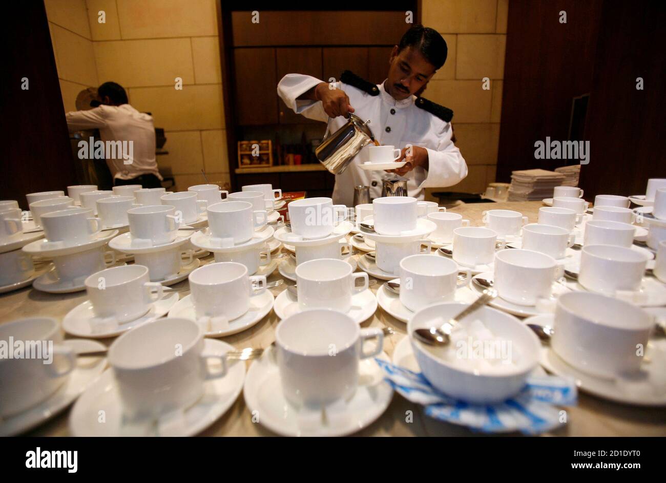 Waiter serves drink drinks hi-res stock photography and images - Alamy