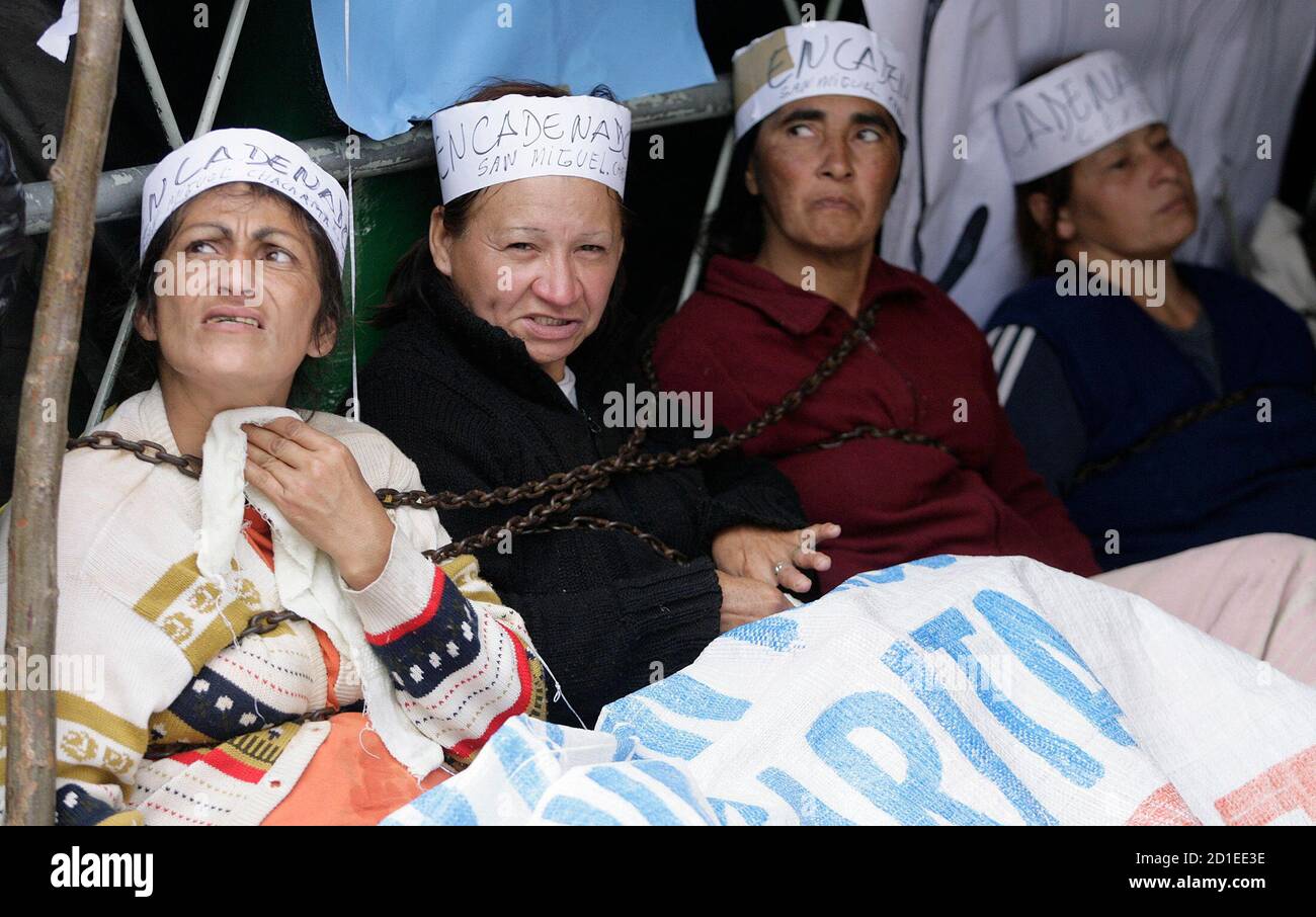 Women chained hi-res stock photography and images - Alamy