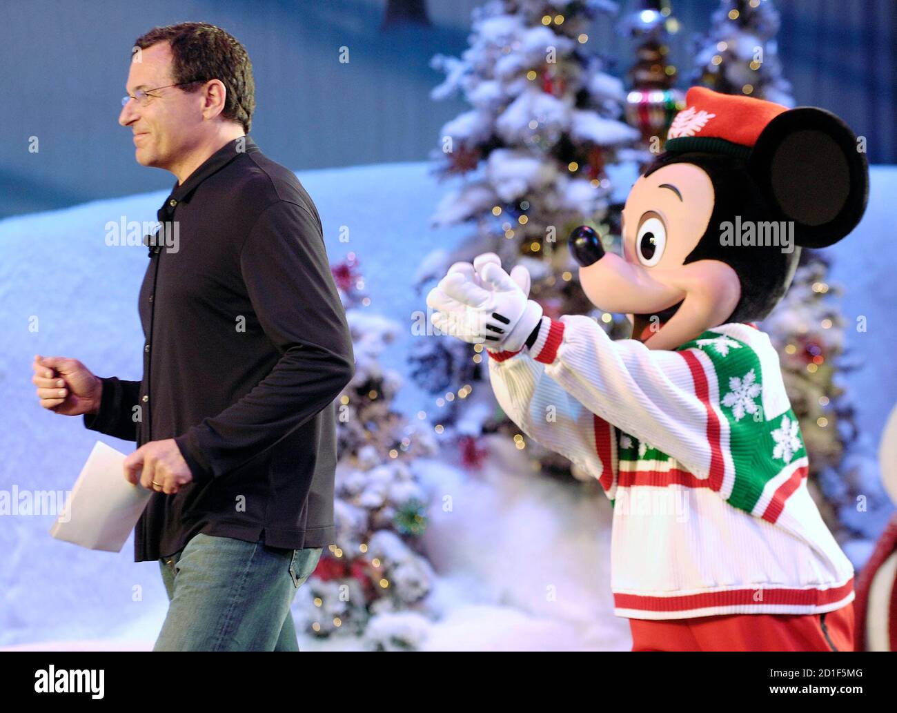 Robert iger mickey mouse hi-res stock photography and images - Alamy