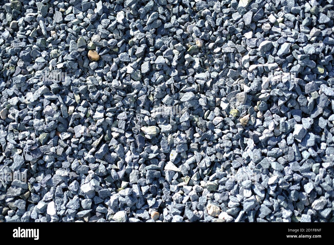 small stones background. grey stones on the ground. texture for ...