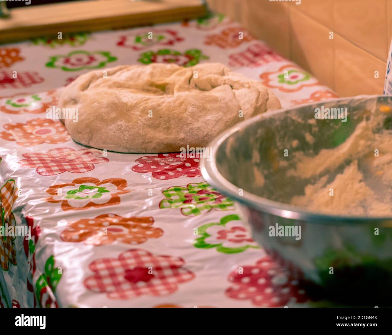 raw bread in the kitchen table of worker home before cook in the oven ...