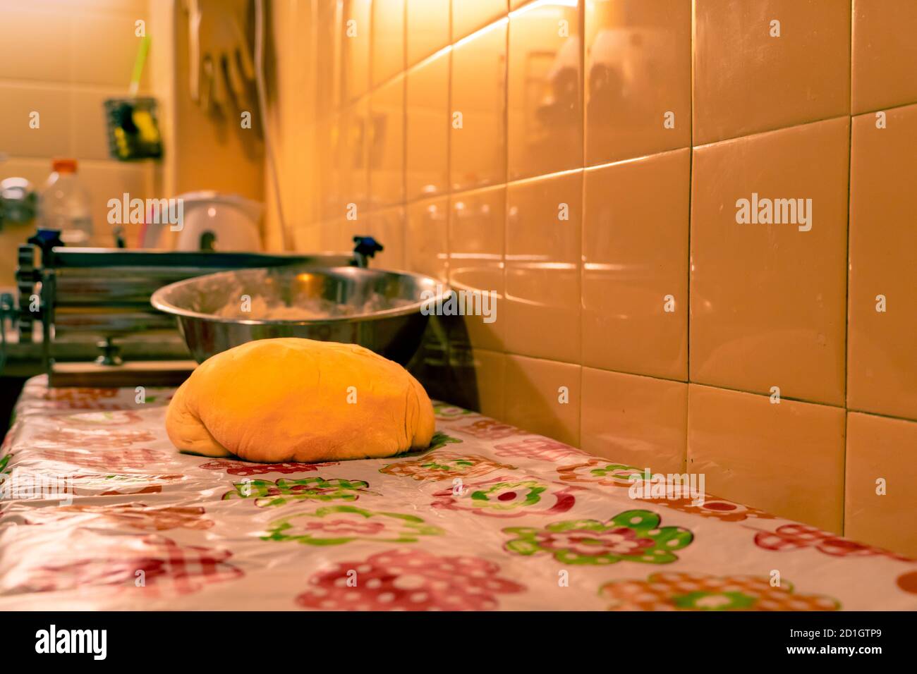 raw bread in the kitchen table of worker home before cook in the oven ...