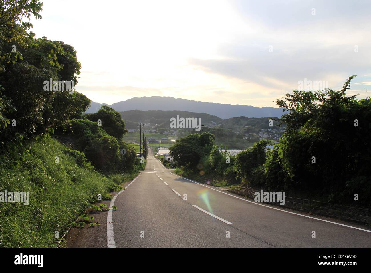 Country road and sunset with mountains as background in Asuka, Japan ...