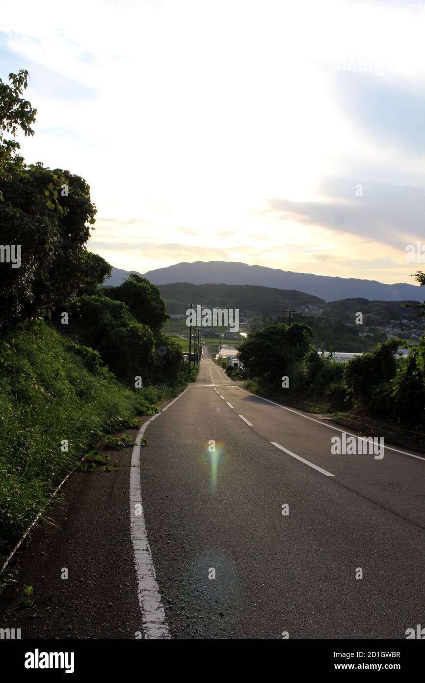 Country road and sunset with mountains as background in Asuka, Japan ...