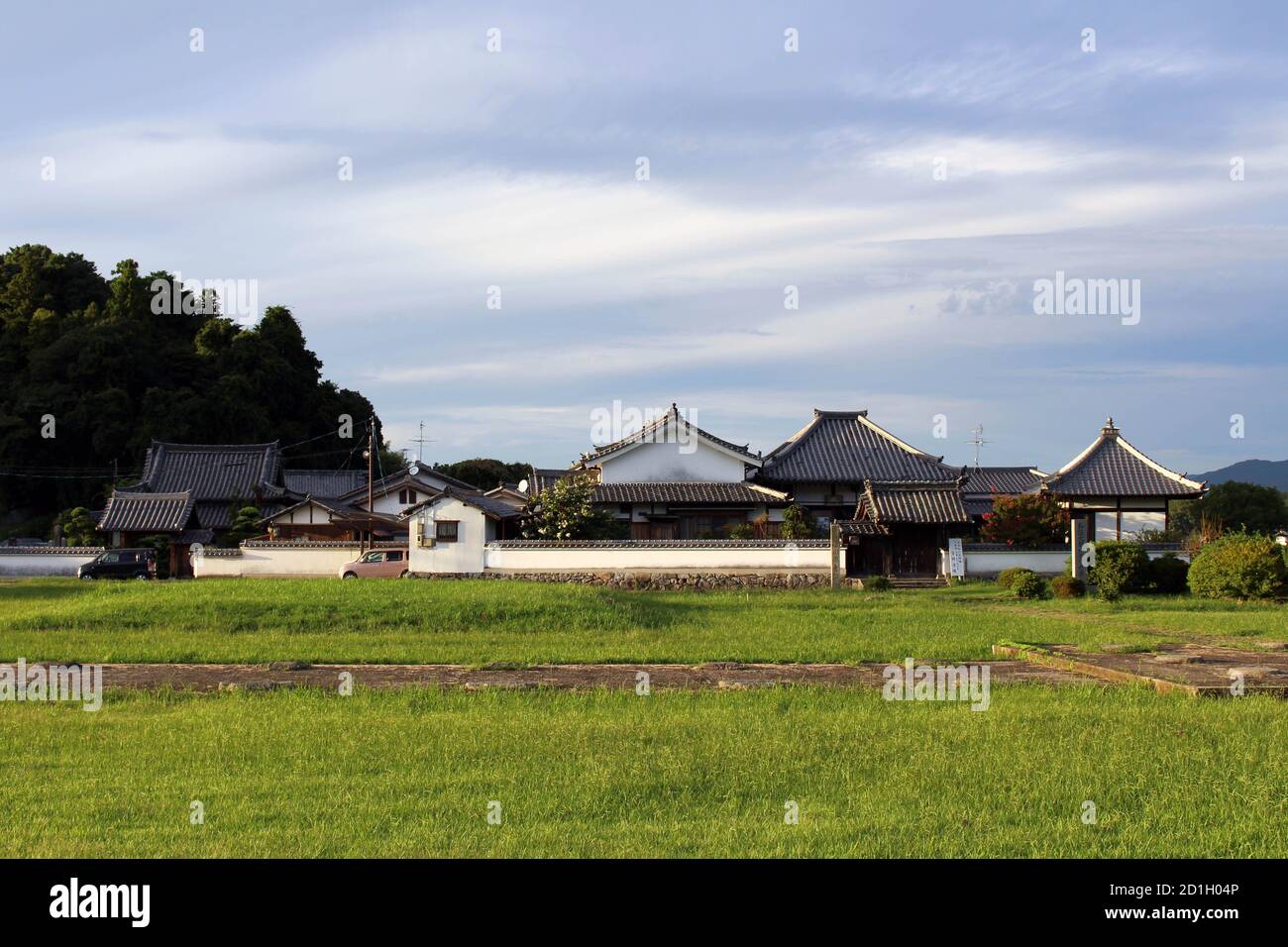 Green field and traditional house in a village of Asuka. Taken in ...