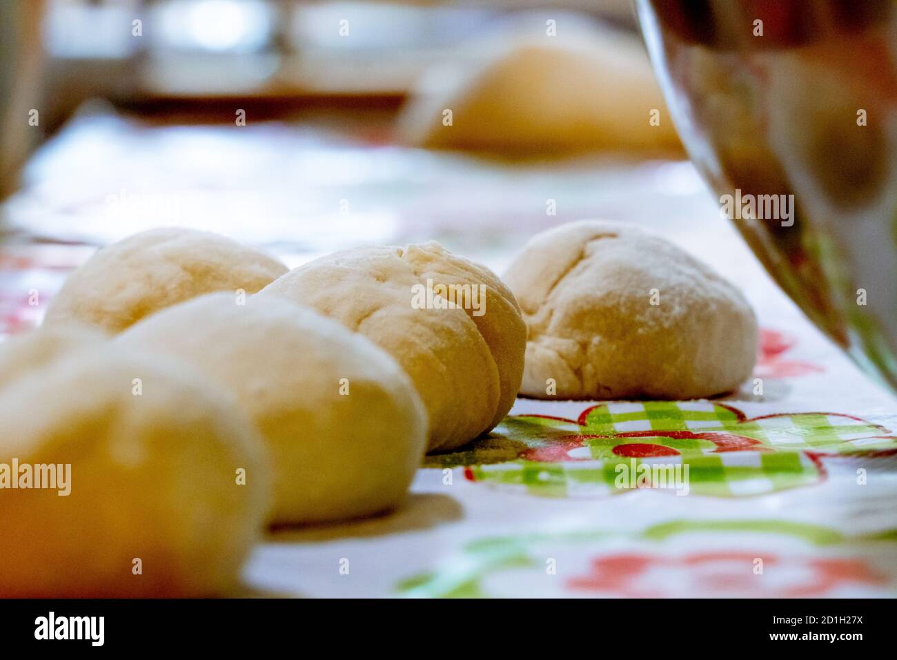 balls of pastry ready to the oven at the home kitchen Stock Photo - Alamy