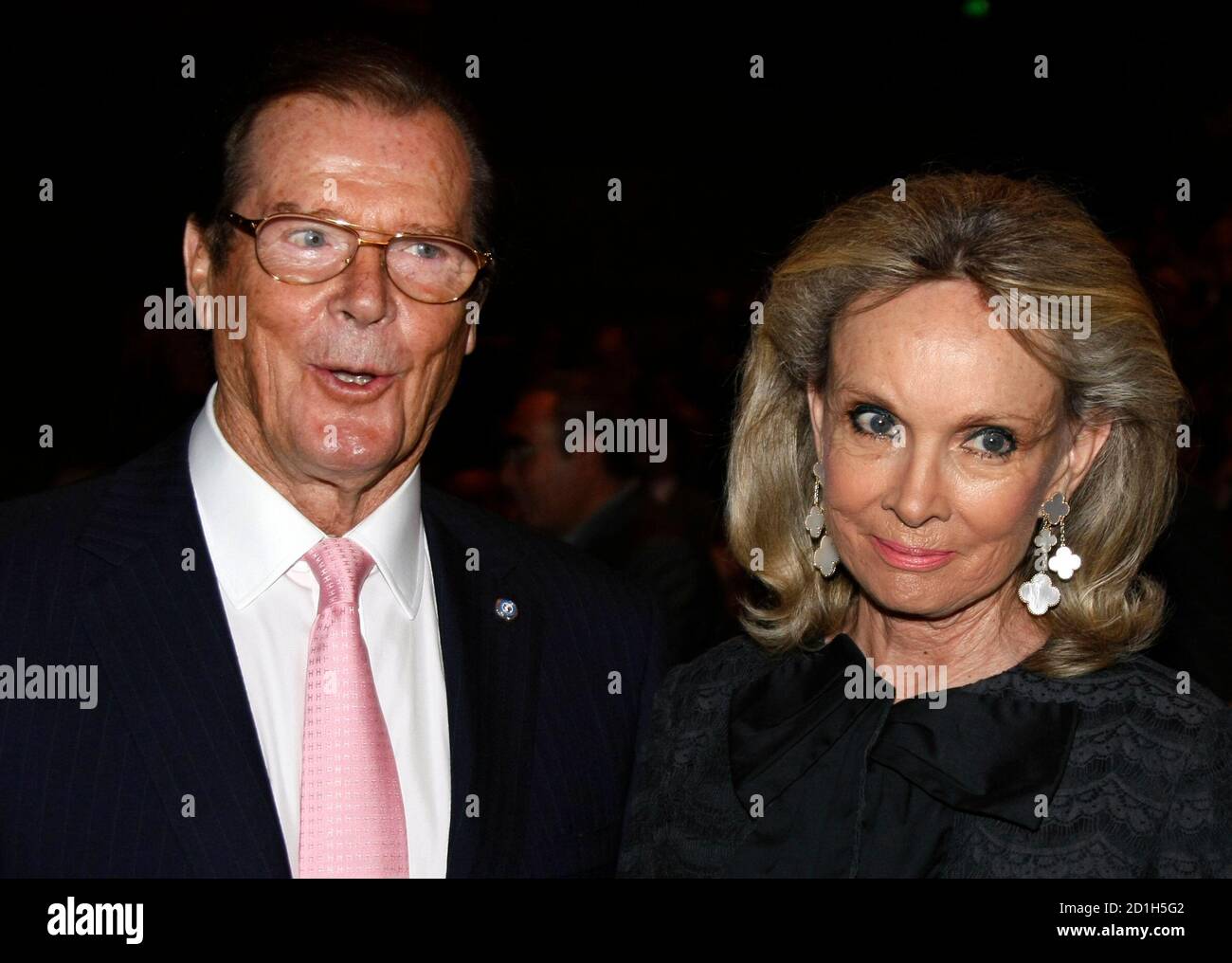 Roger moore poses with his wife hi-res stock photography and images - Alamy