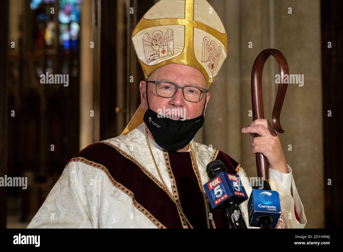 Cardinal Timothy Dolan speaks to media after the NYPD mass honoring ...