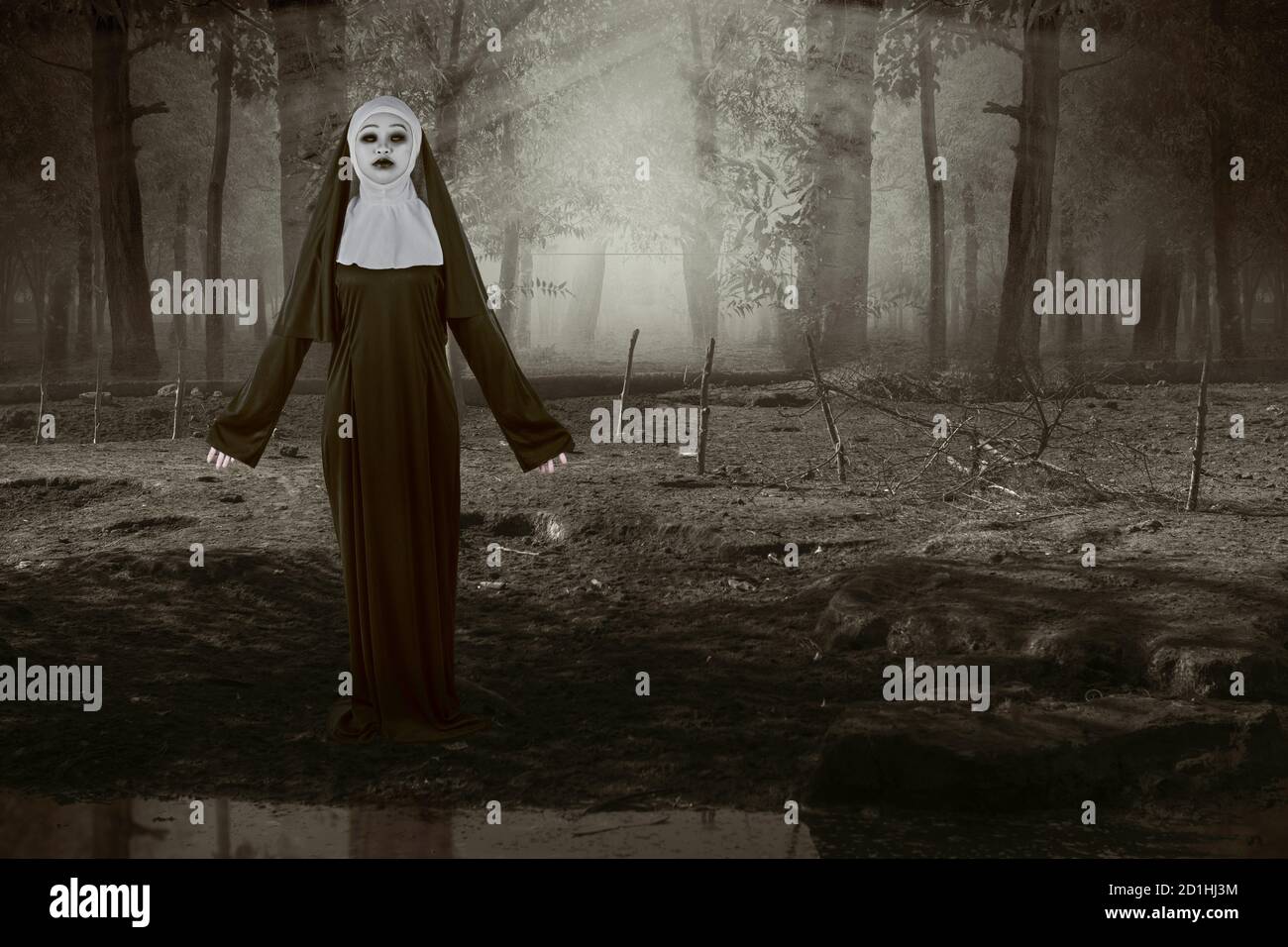 Scary devil nun standing on the haunted forest Stock Photo - Alamy