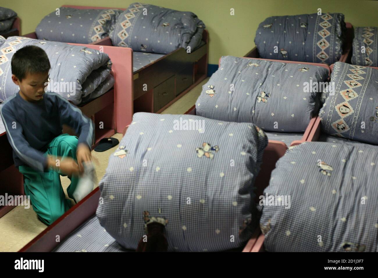 Chinese orphanage hi-res stock photography and images - Alamy