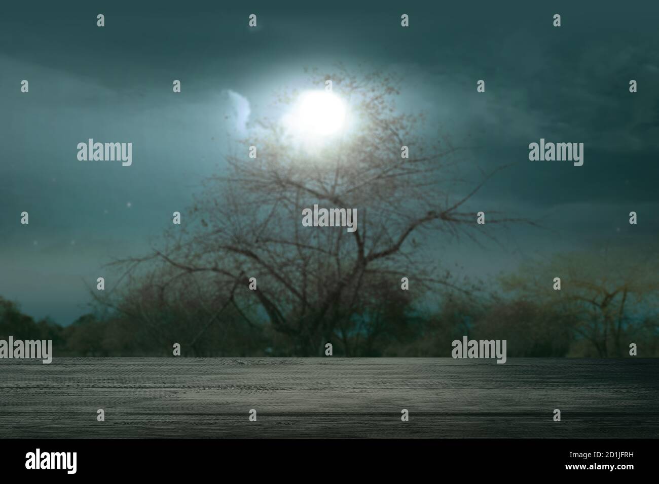 Wooden table with a night scene background Stock Photo - Alamy