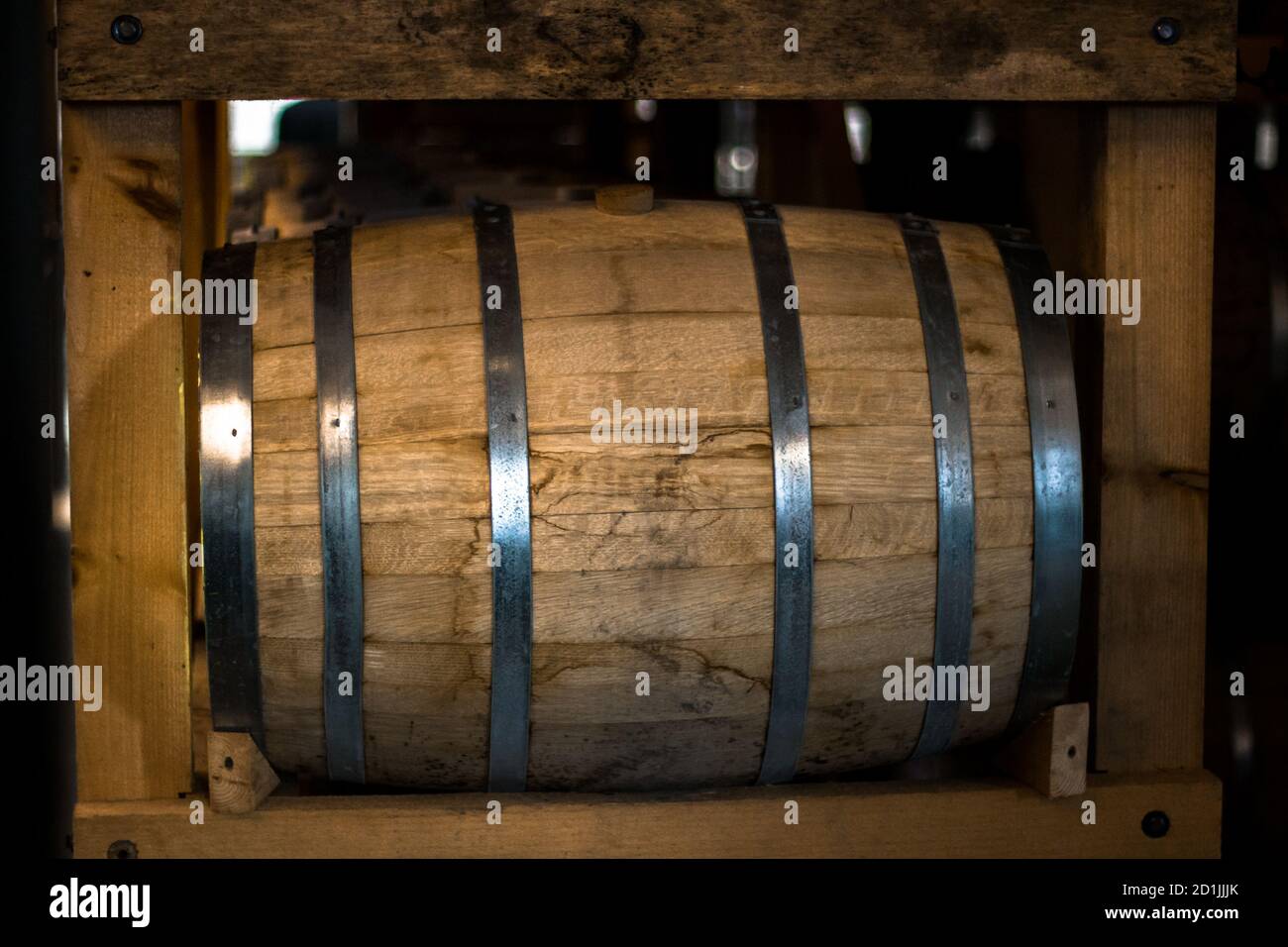 Old wooden barrels in the courtyard of an old house. Vintage lifestyle ...