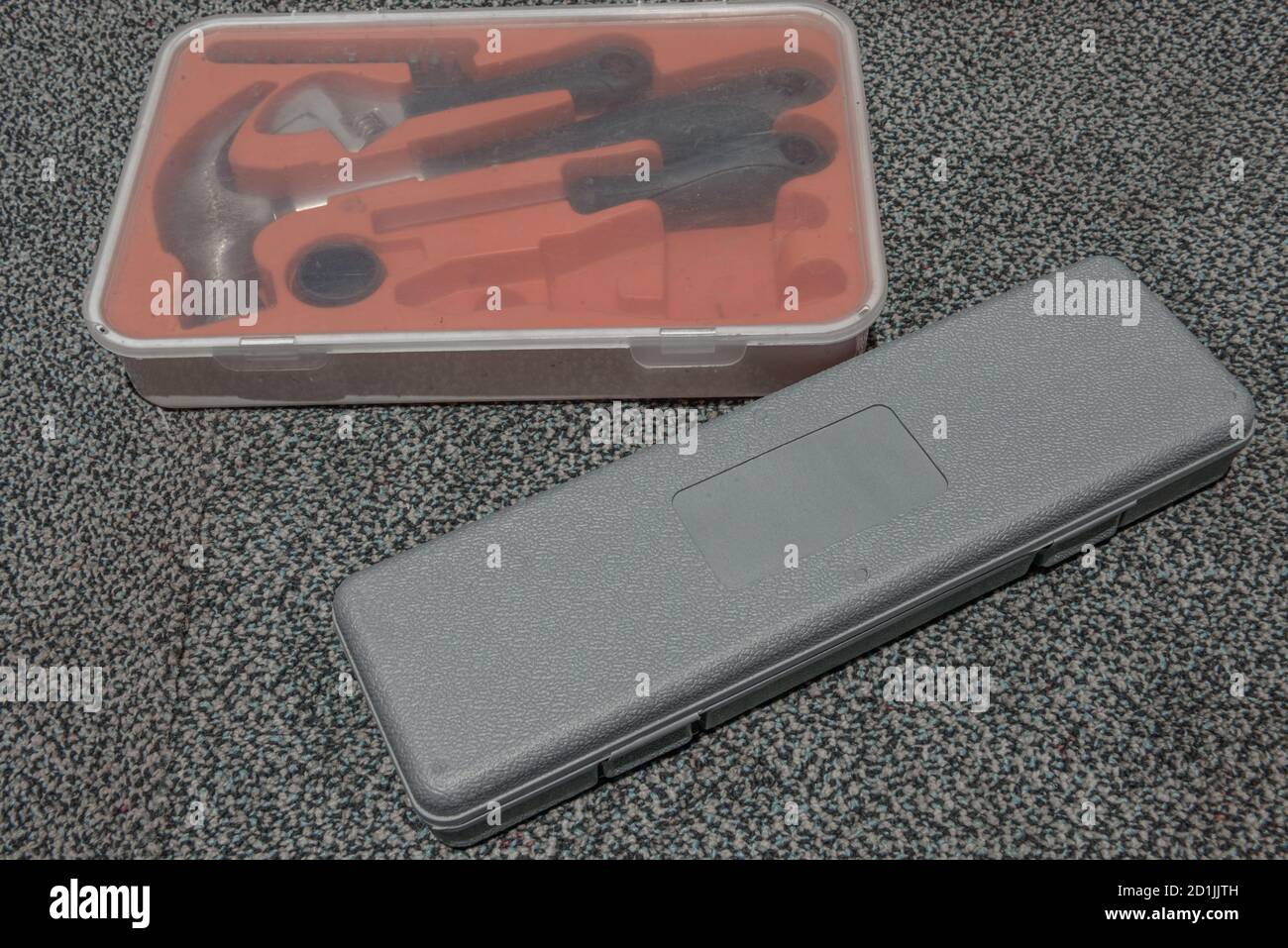 Toolbox on the carpet Stock Photo - Alamy