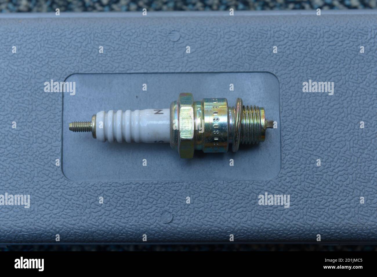 Close up view of the spark plug on the toolbox Stock Photo - Alamy