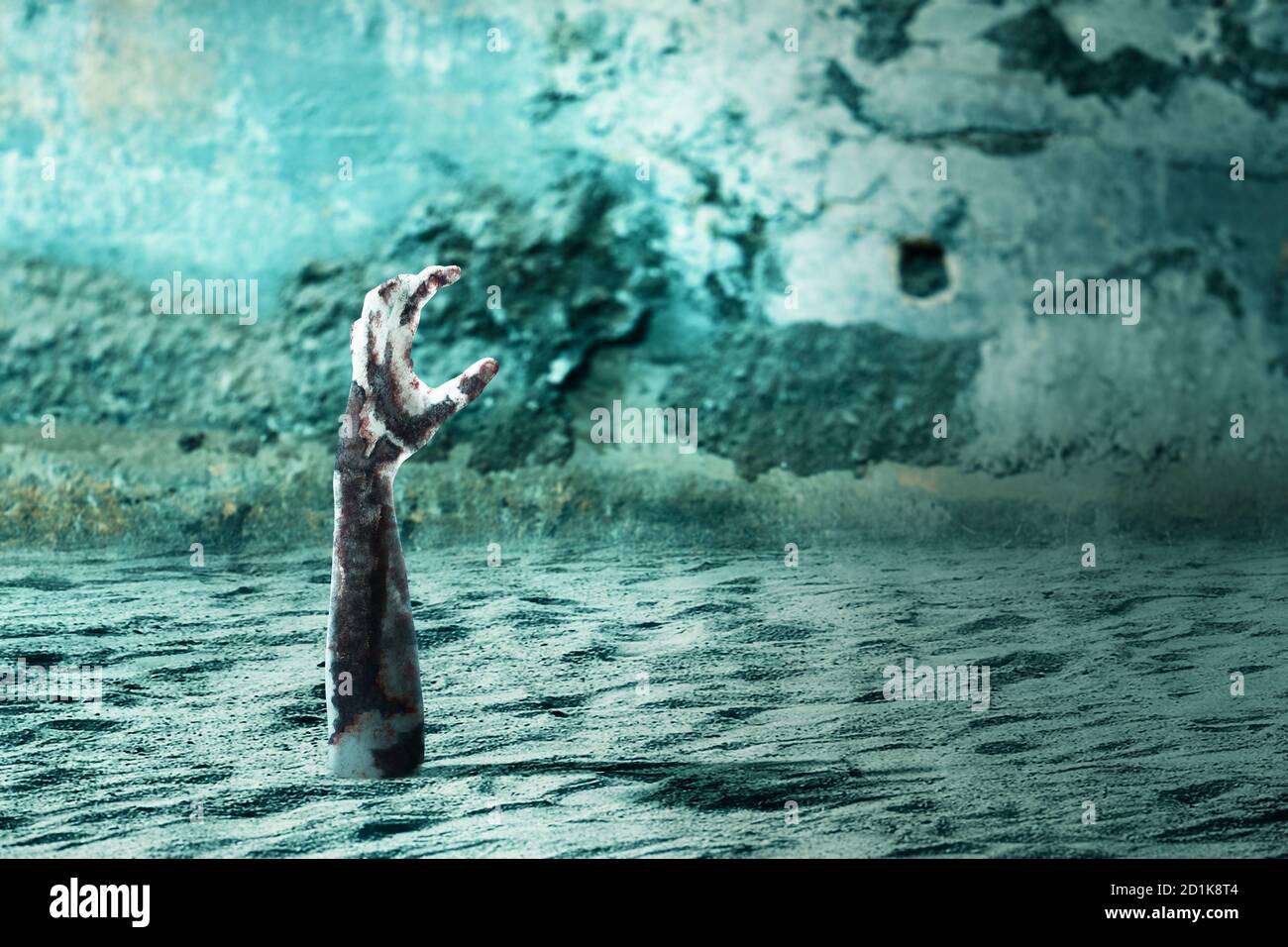Zombie hand with blood and wound raised from the ground Stock Photo - Alamy