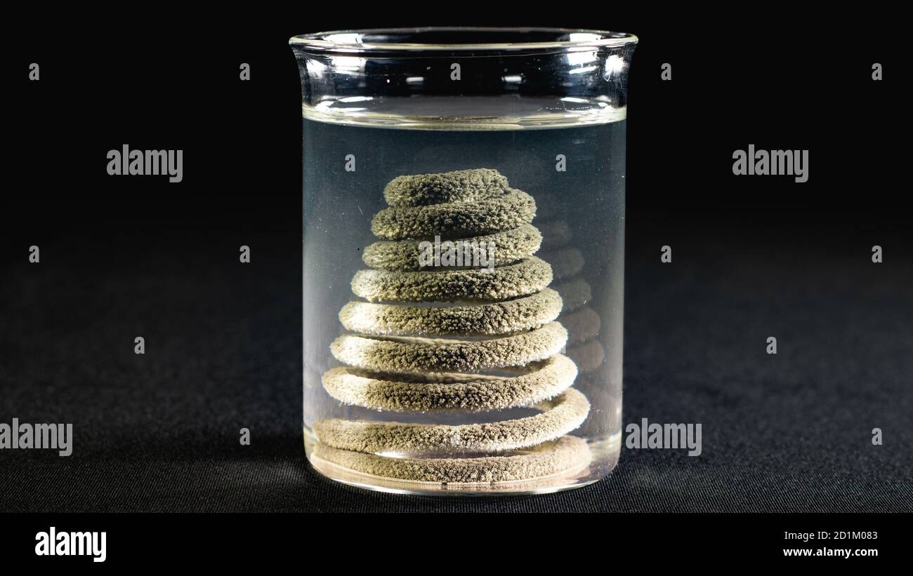 Chemical reaction copper wire and argentum liquid Stock Photo - Alamy