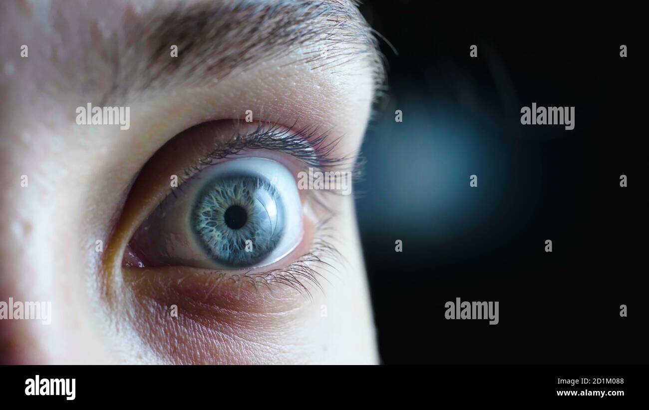 Photo of the grey woman's wide eye Stock Photo - Alamy