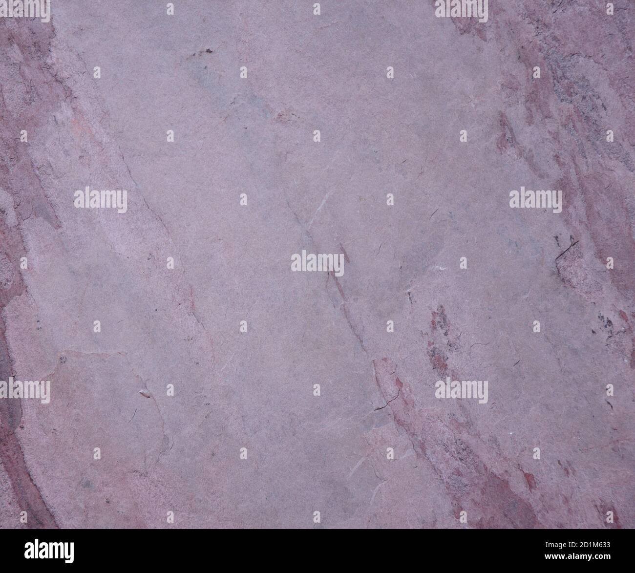 Maroon marble with gray inlays, close-up of polished natural stone ...