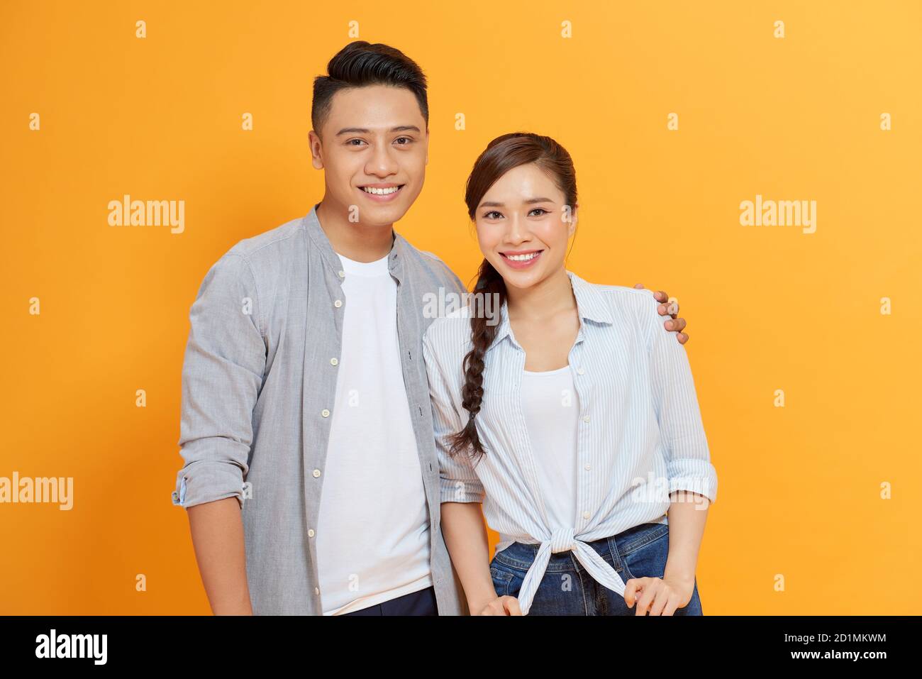 Couple life partners perfect match isolated over yellow color ...