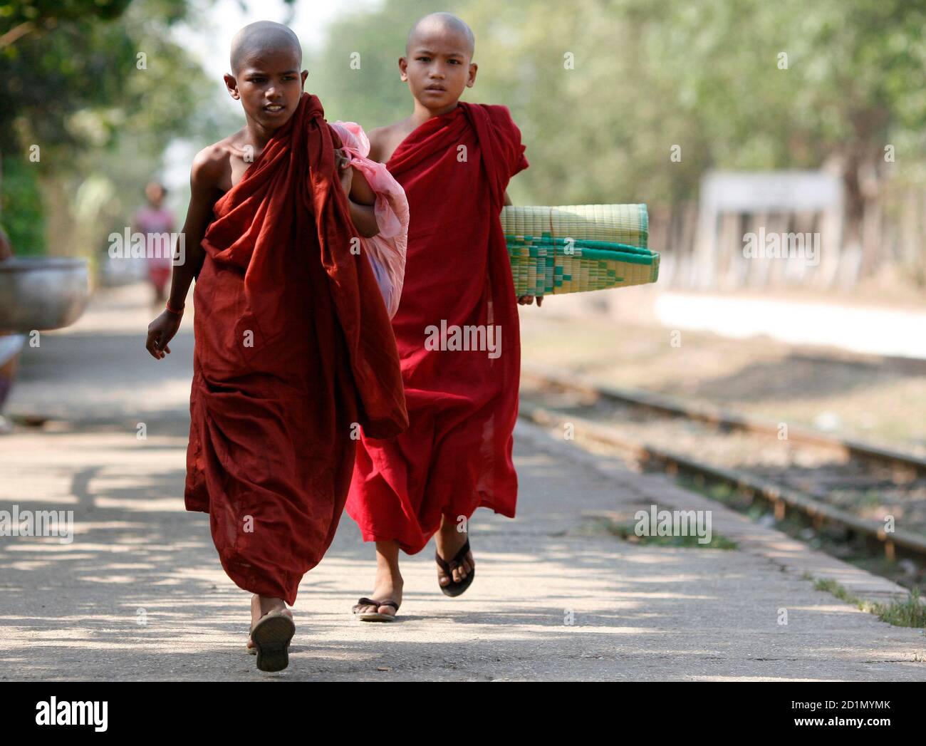 Buddhist monks at railway station hi-res stock photography and images ...