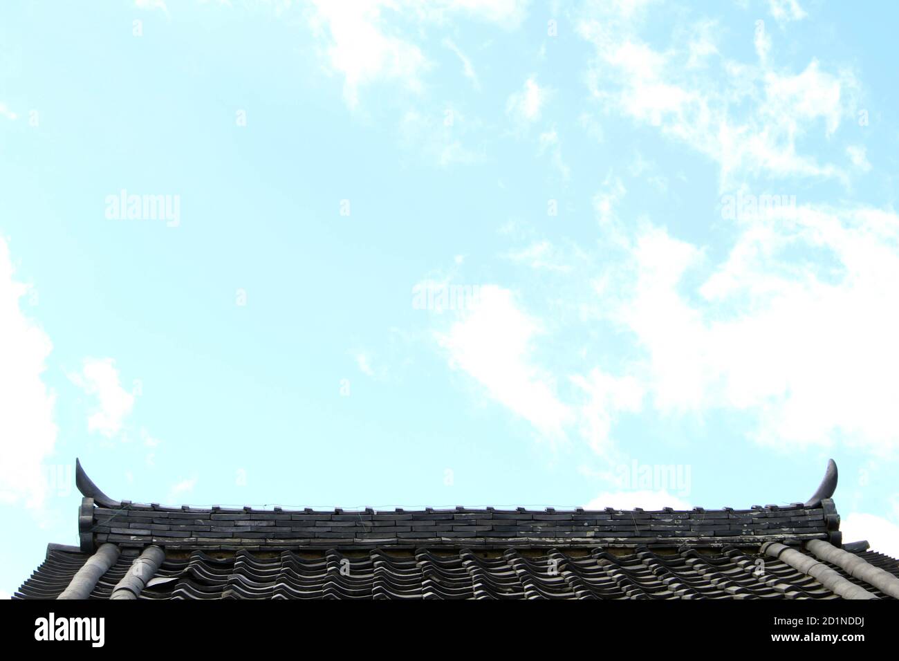 Japanese traditional roof style, with some carving, at one house Stock ...