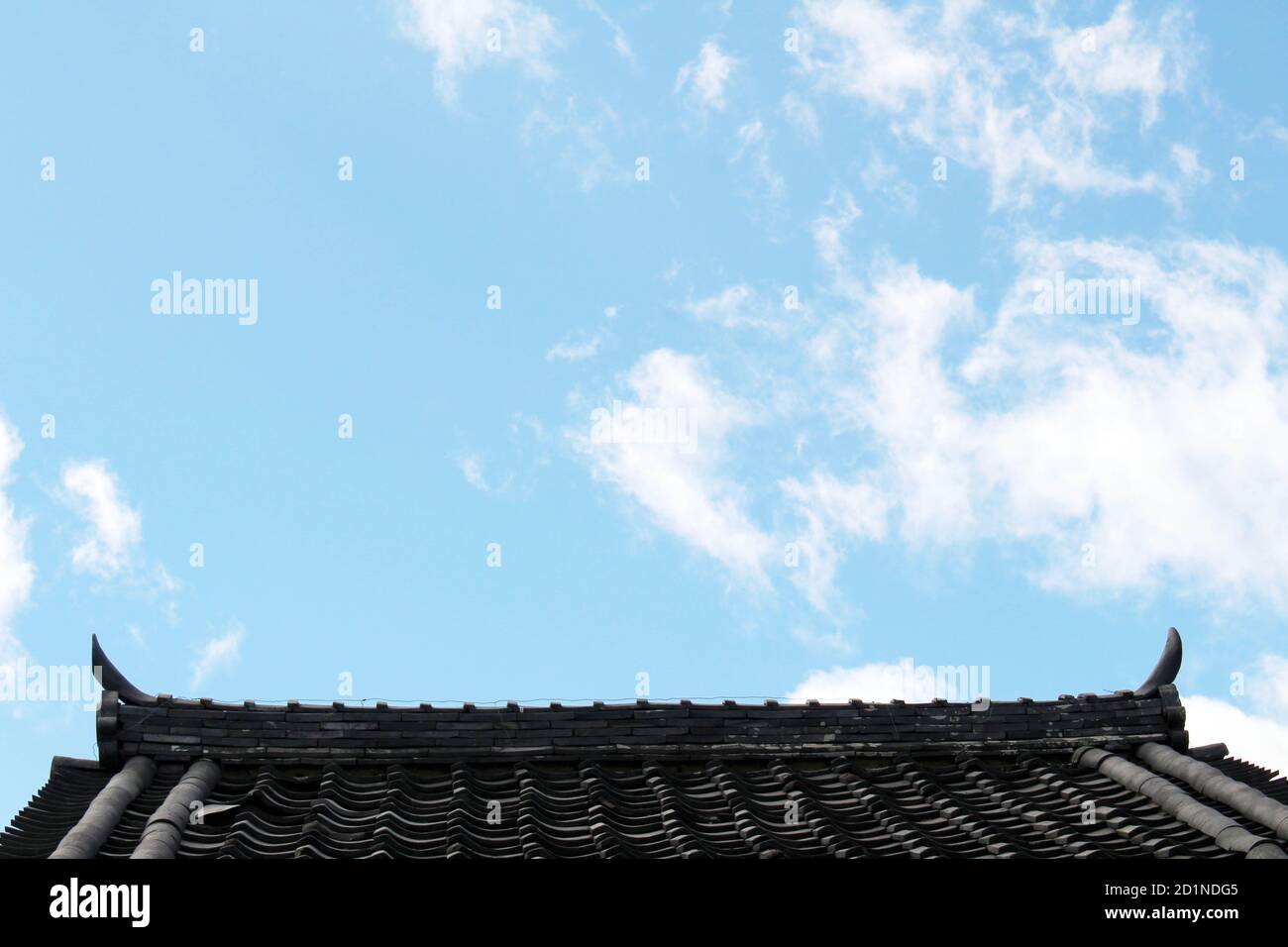 Japanese traditional roof style, with some carving, at one house Stock ...