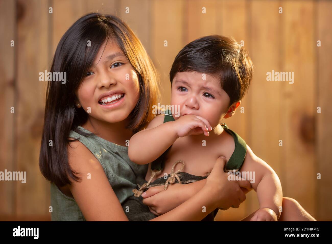 Mexican siblings smiling and cryingisolated Stock Photo - Alamy