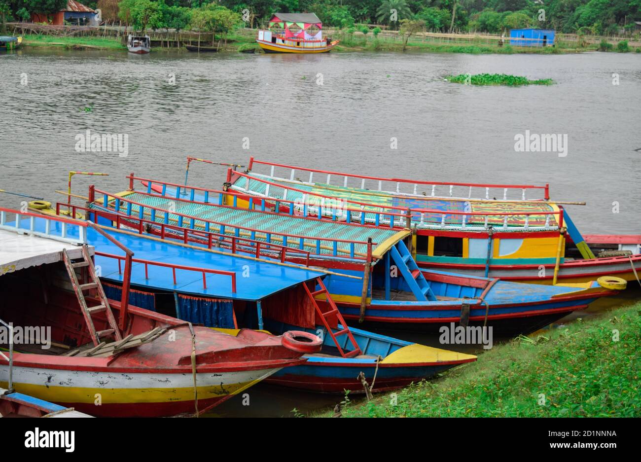 Boats parking - small boats on river side Stock Photo - Alamy