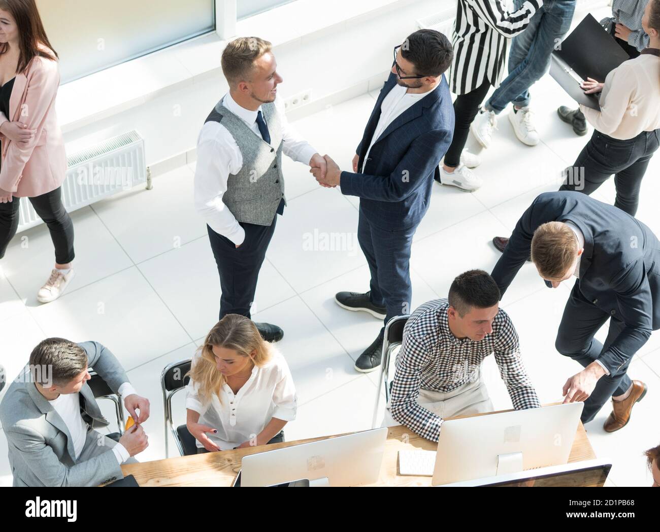 top view. group of employees in a modern office Stock Photo - Alamy