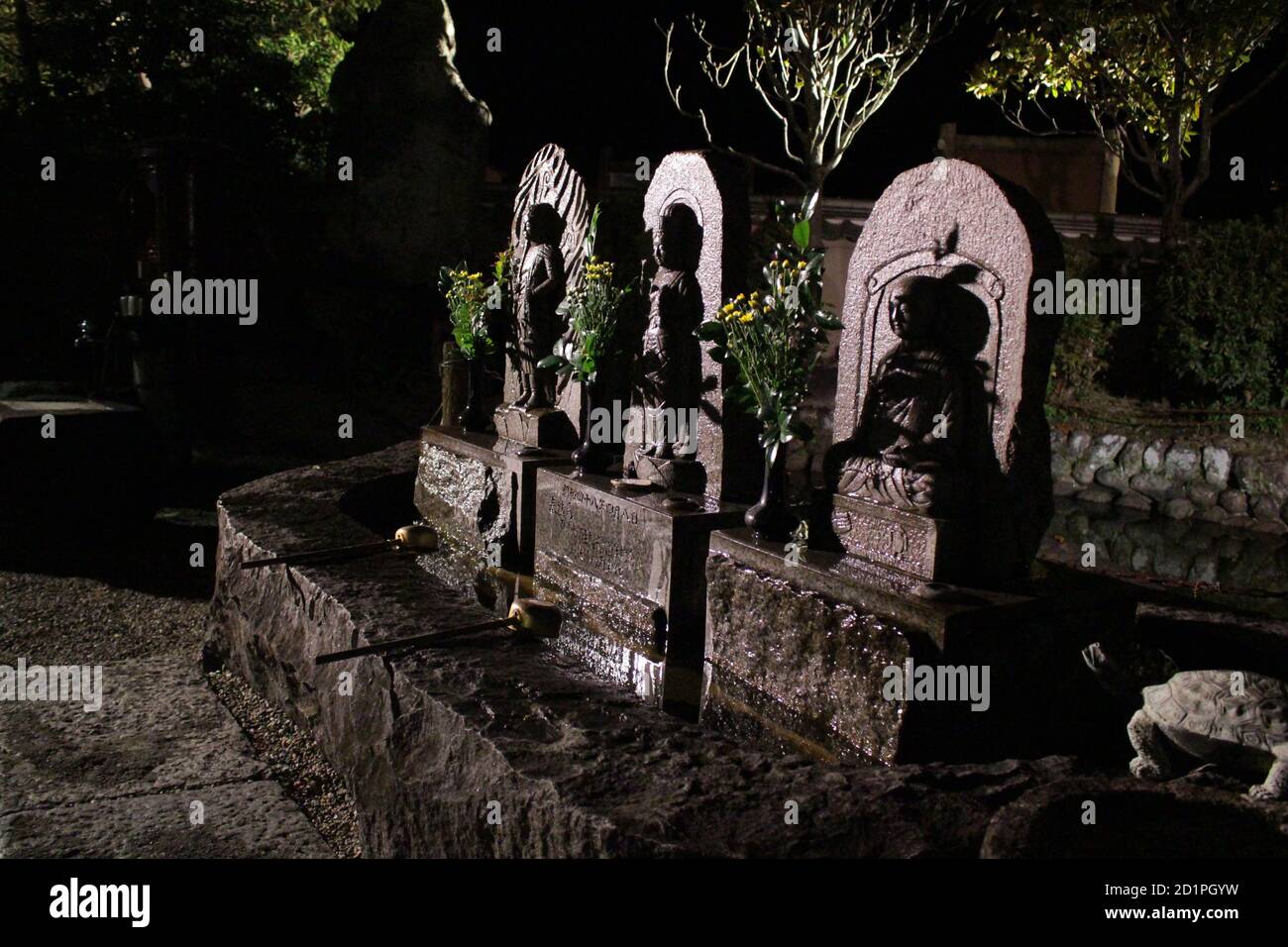 Holy statues at Buddhist Asukadera Temple in Asuka at night. Taken in ...