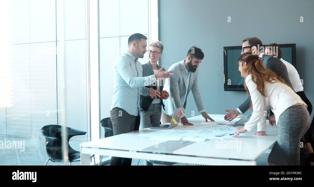 Perspective businesspeople having meeting in conference room Stock Photo - Alamy