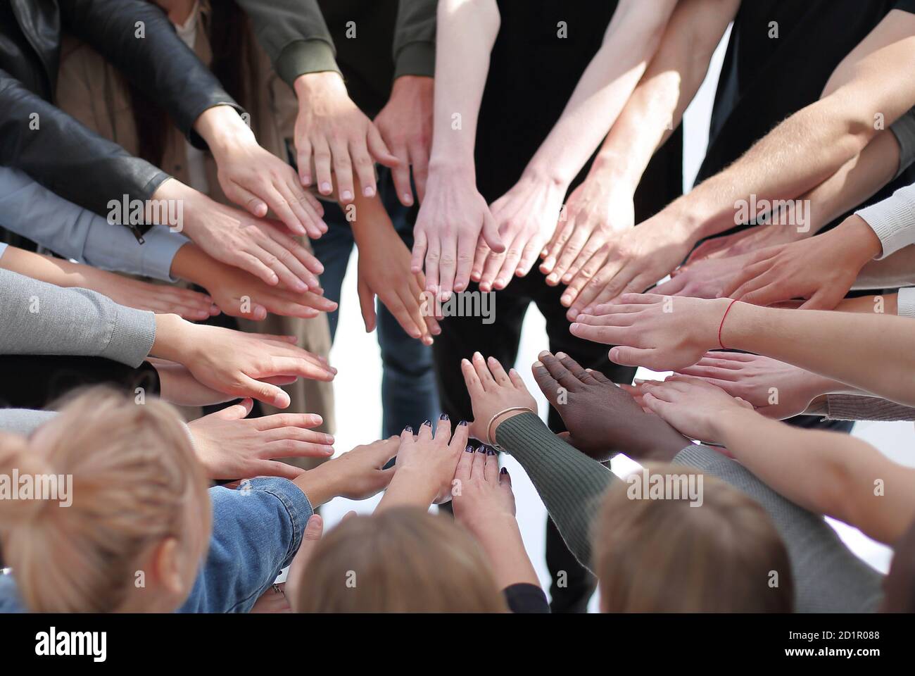 Diverse hands in a circle hi-res stock photography and images - Alamy