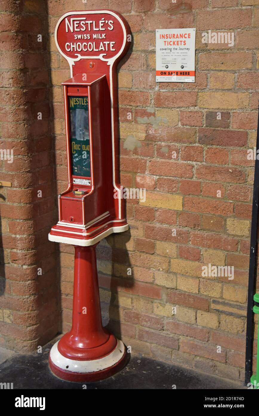 A vintage station platform vening machine for Nestles chocolate on ...