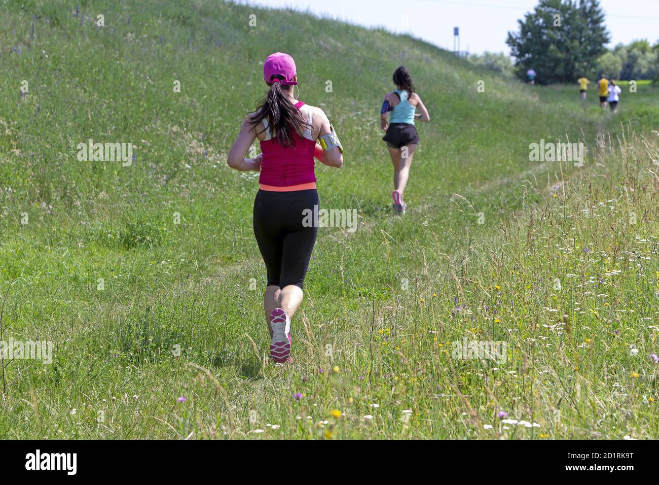Beautiful women running hi-res stock photography and images - Alamy
