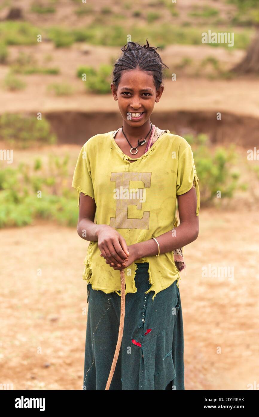 AMHARA REGION, ETHIOPIA, APRIL 22.2019, Ethiopian shepherdess girl with ...