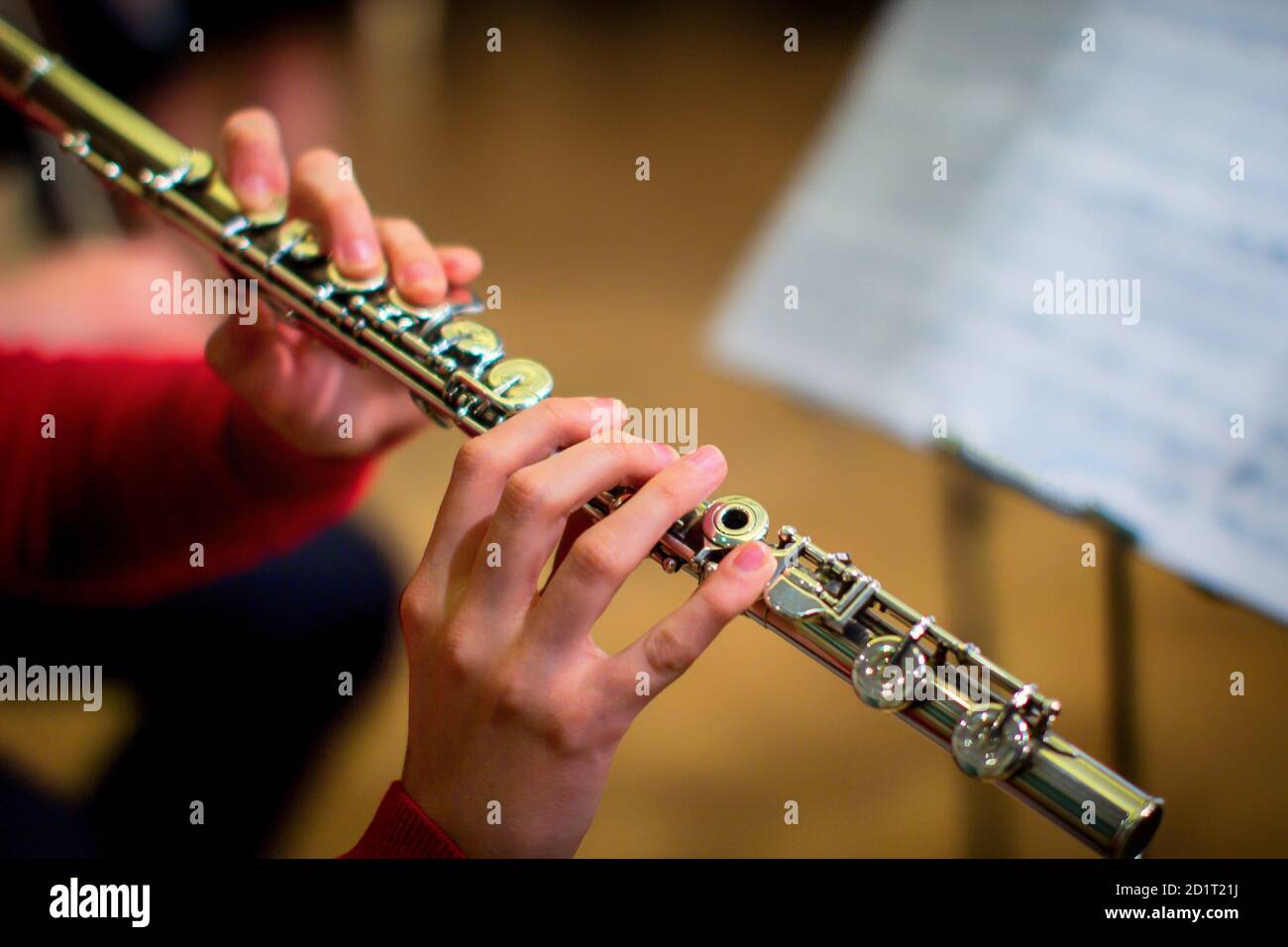 Professional female flutist in concert hi-res stock photography and ...